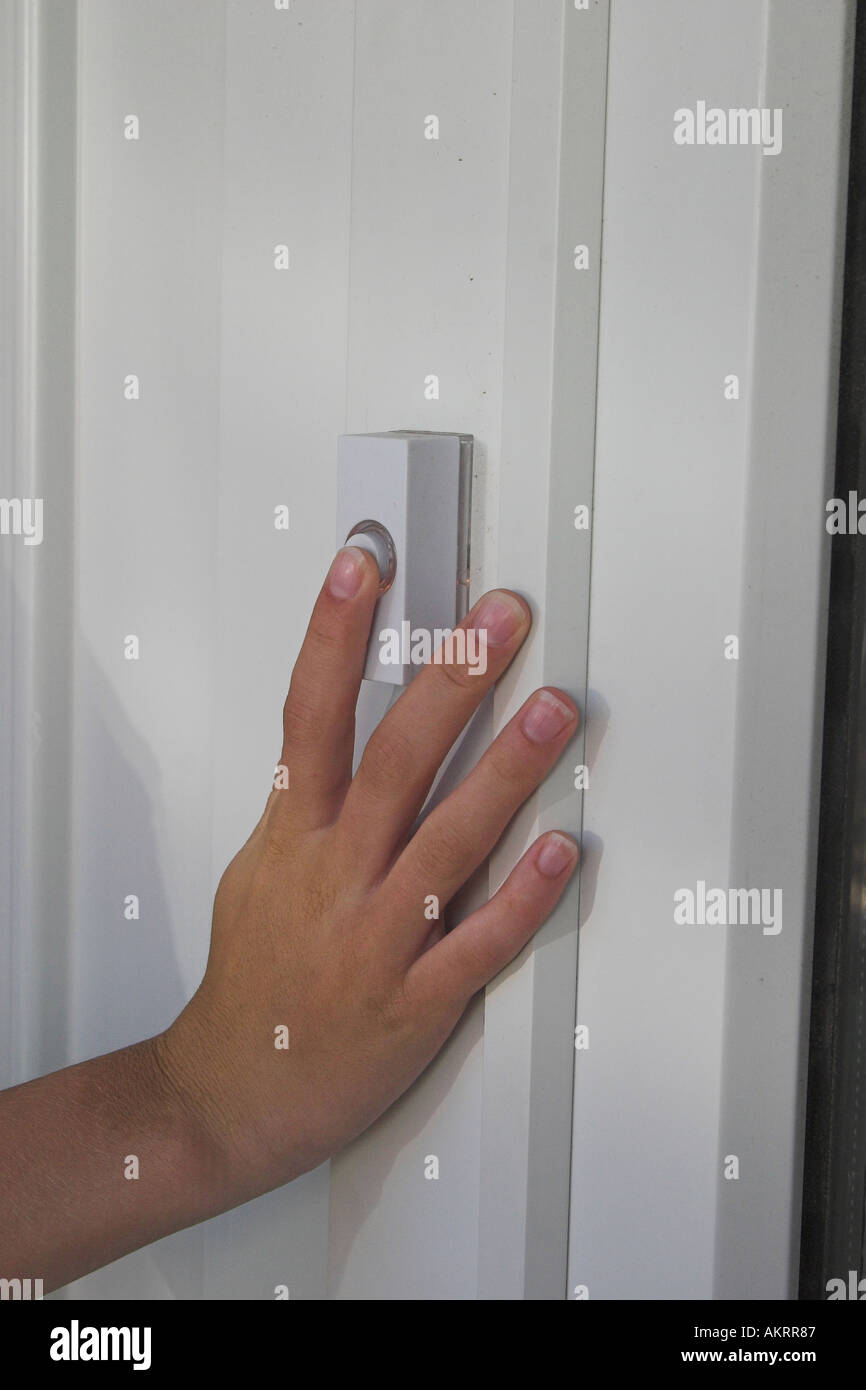 lady ringing the doorbell Stock Photo - Alamy