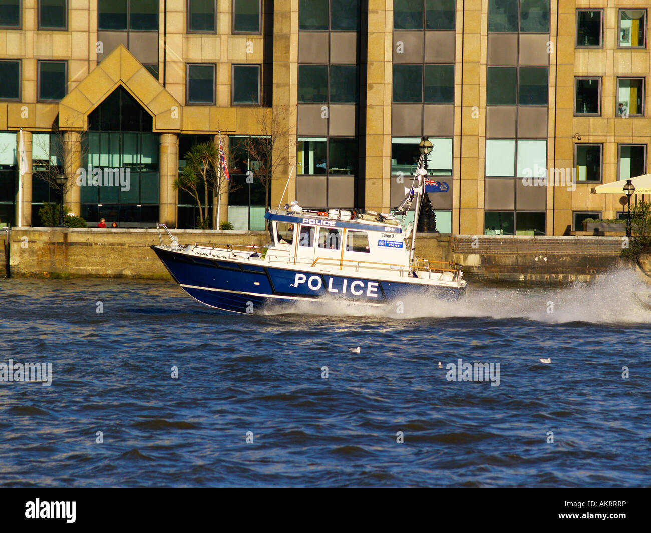 Speeding police boat hi-res stock photography and images - Alamy
