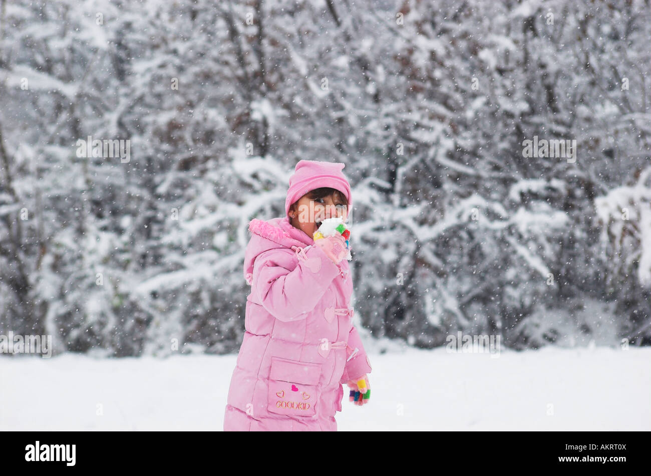 Girl Tasting Snowball Stock Photo - Alamy