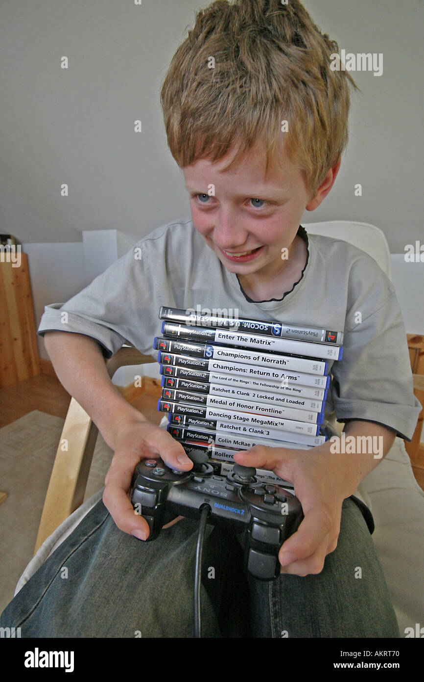 boy playing on a computer game Stock Photo - Alamy