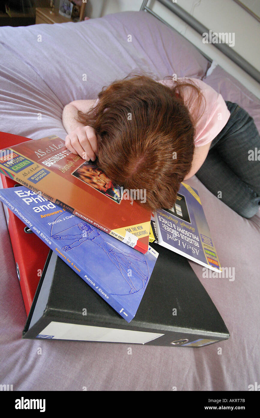 girl suffering from exam stress Stock Photo - Alamy