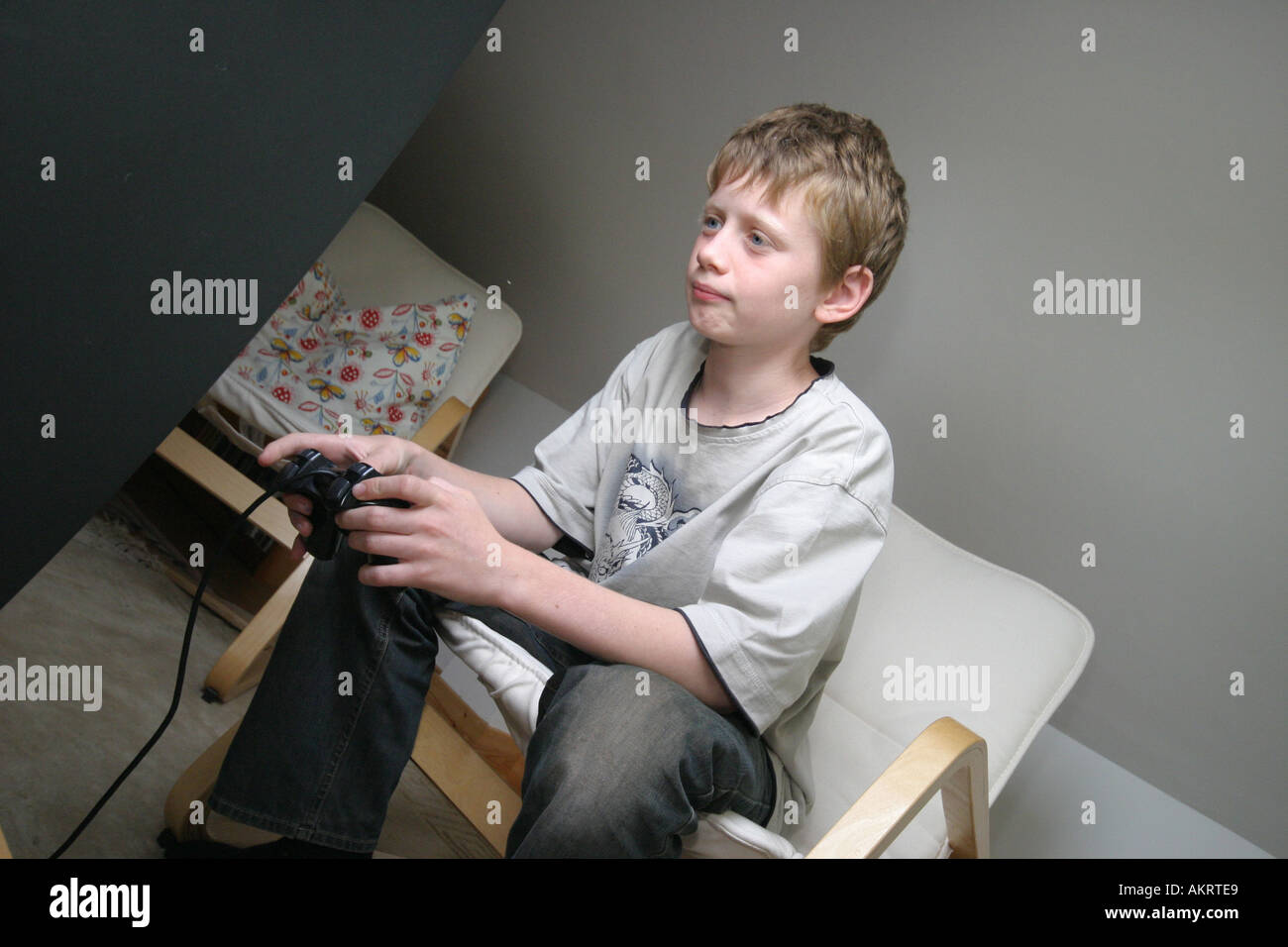 boy playing on a computer game Stock Photo - Alamy