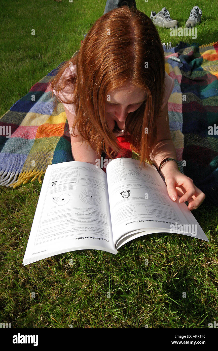 girl revising in the sun outside Stock Photo - Alamy
