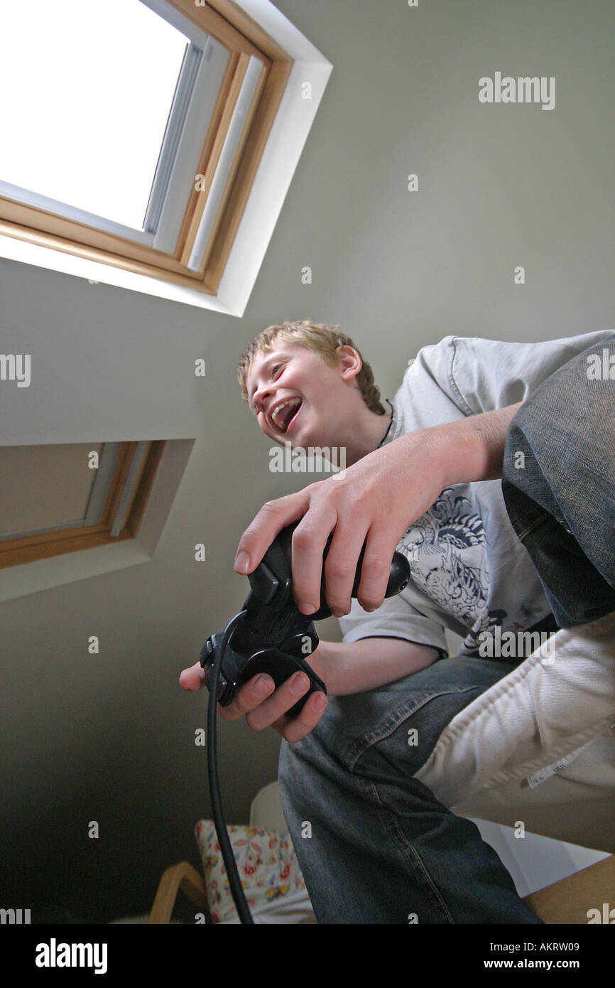 boy playing on a computer game Stock Photo - Alamy