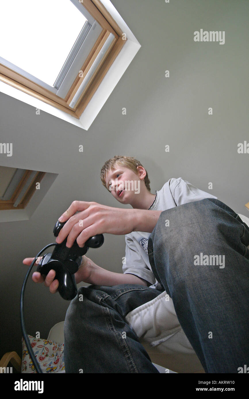 boy playing on a computer game Stock Photo - Alamy