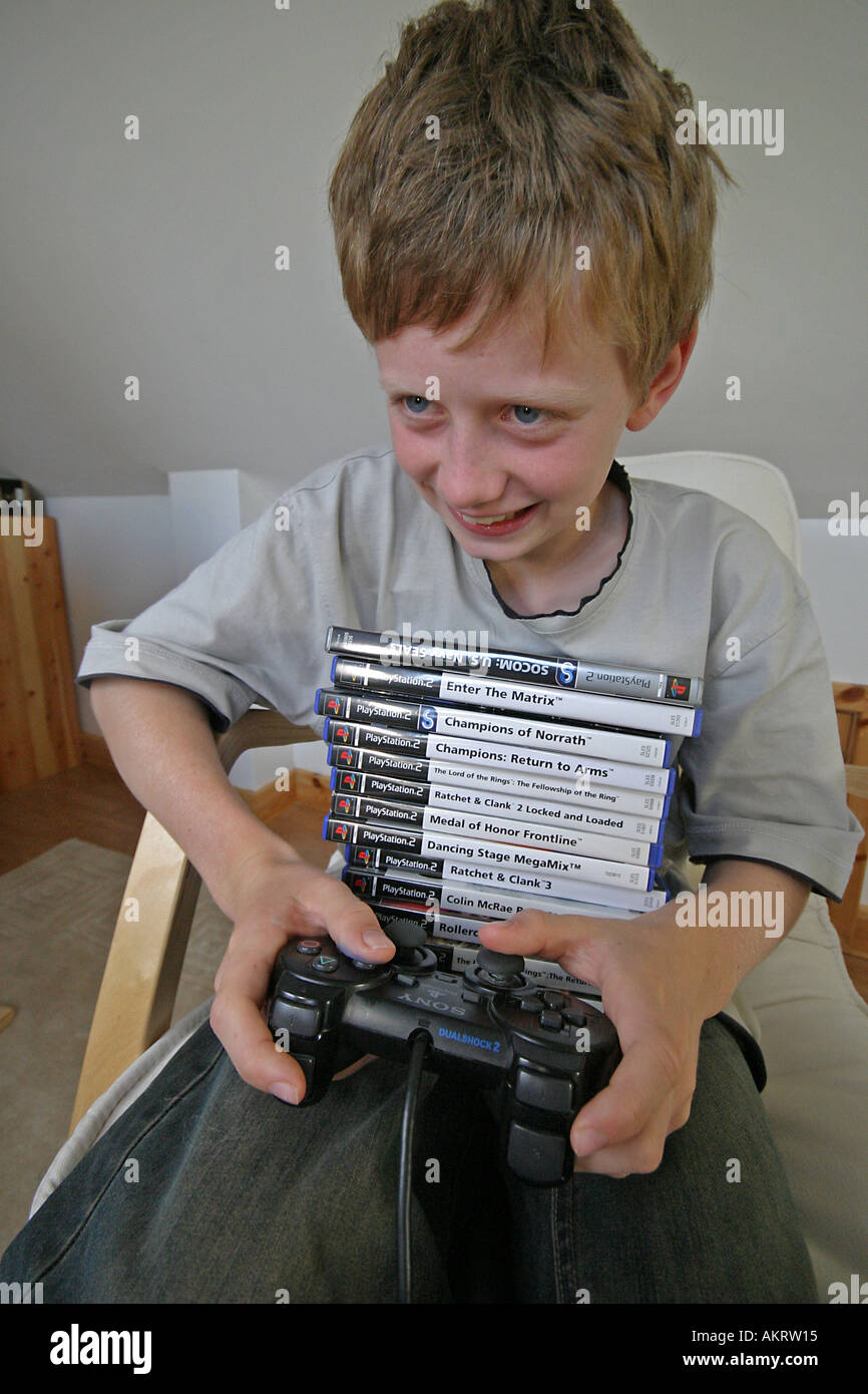 boy playing on a computer game Stock Photo - Alamy