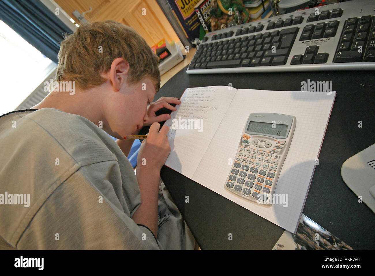 boy doing homework in his bedroom Stock Photo - Alamy