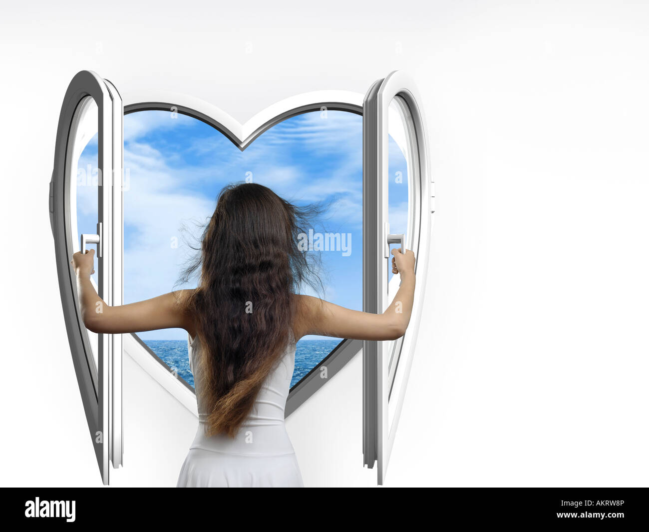 Beautiful woman in white summer dress opening a heart shaped window ...