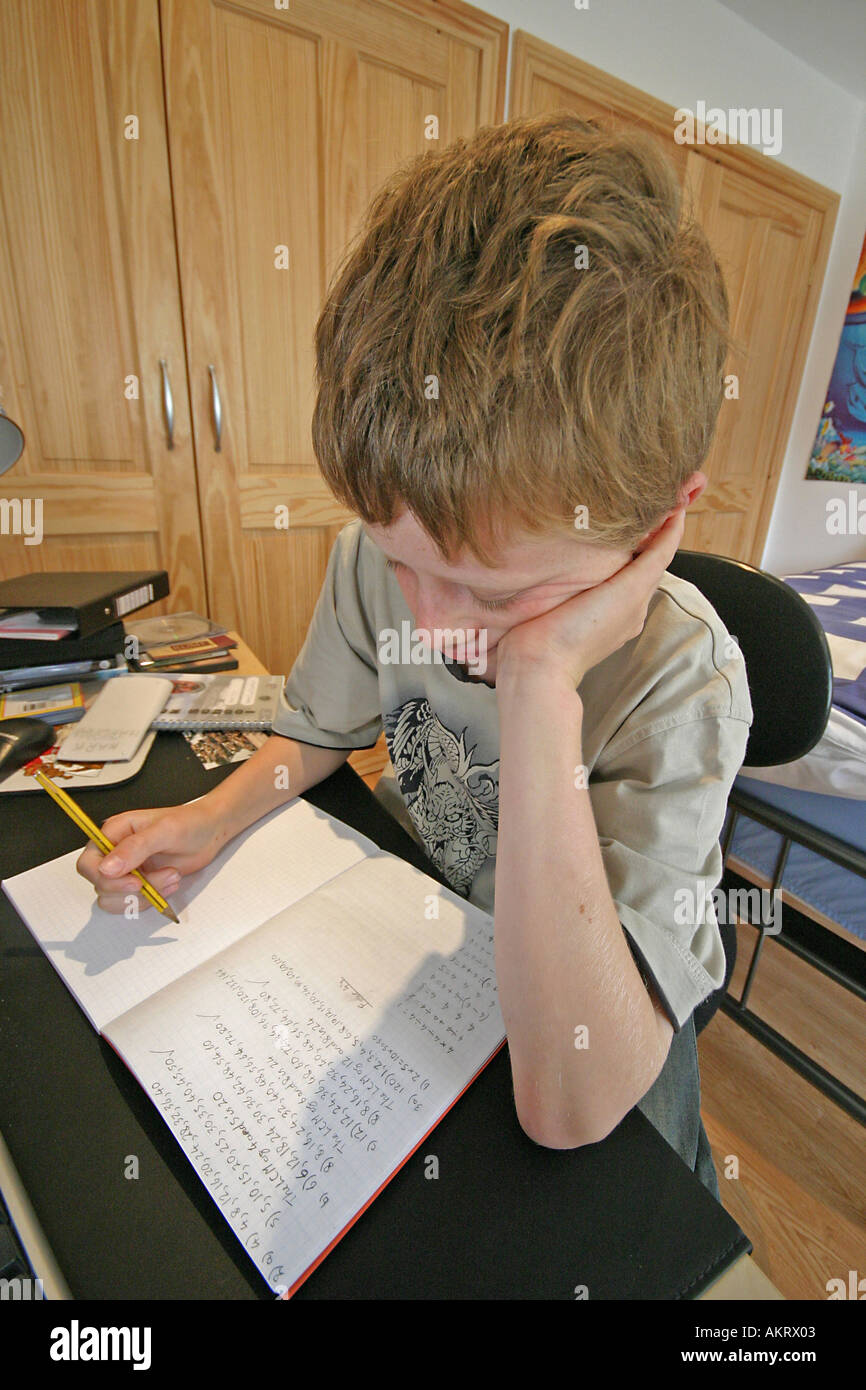 boy doing homework in his bedroom Stock Photo - Alamy