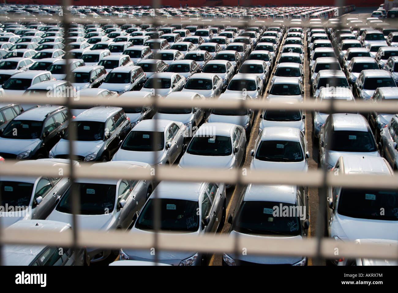 cars behind bars view of customs area with new imported cars Stock ...