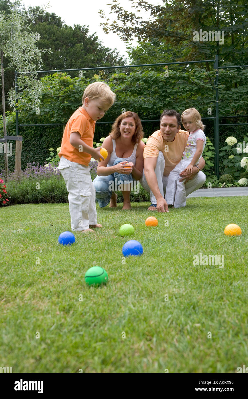 Family playing a game together Stock Photo - Alamy