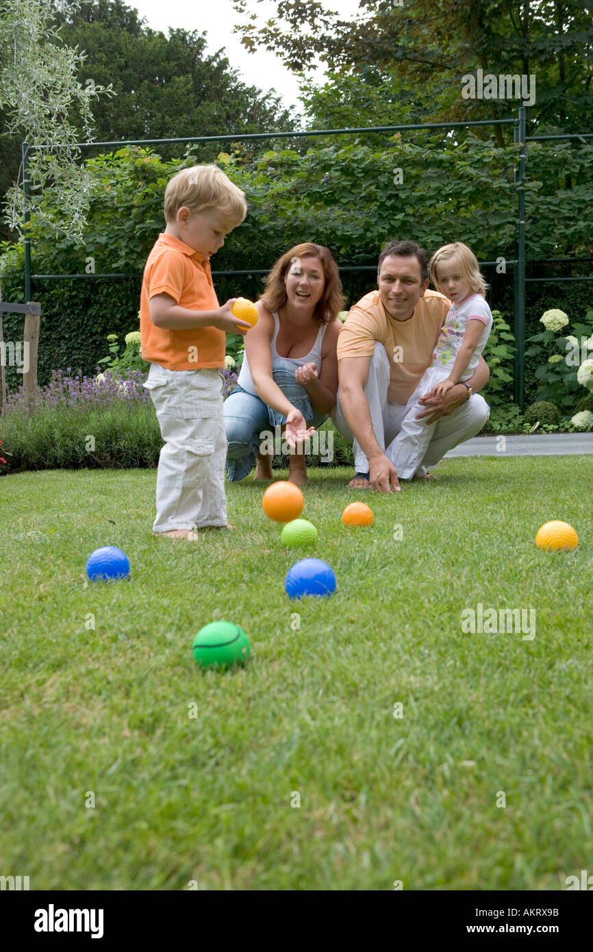 Family playing a game together Stock Photo - Alamy
