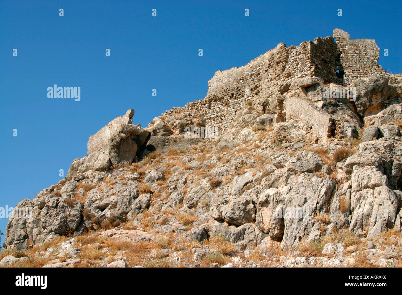 Ruins of an ancient fortess in Haraki, Rhodes Island Stock Photo - Alamy