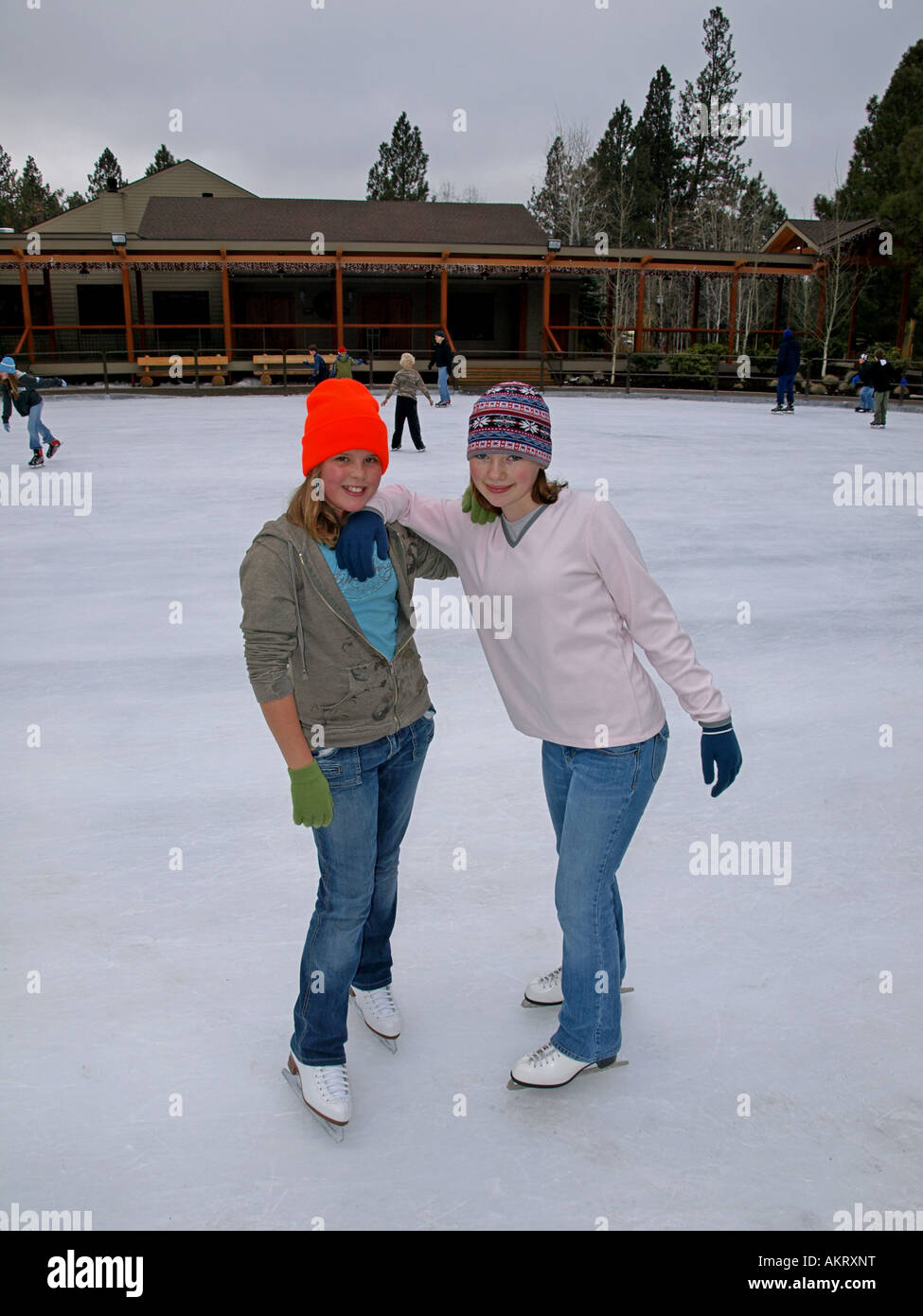 Ice skaters enjoy a fun day on the ice rink at the Stock Photo - Alamy