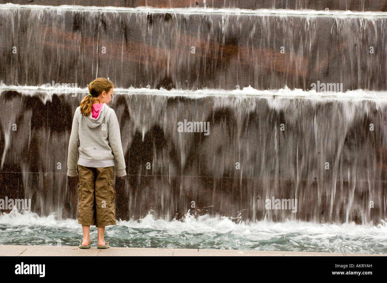 A young girl gazing at a water dispaly in the FDR Memorial at the tidal ...