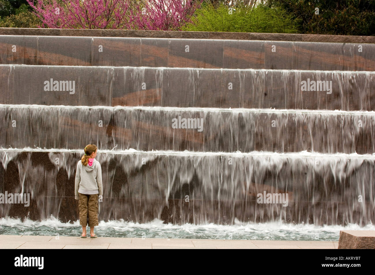 A young girl gazing at a water dispaly in the FDR Memorial at the tidal ...