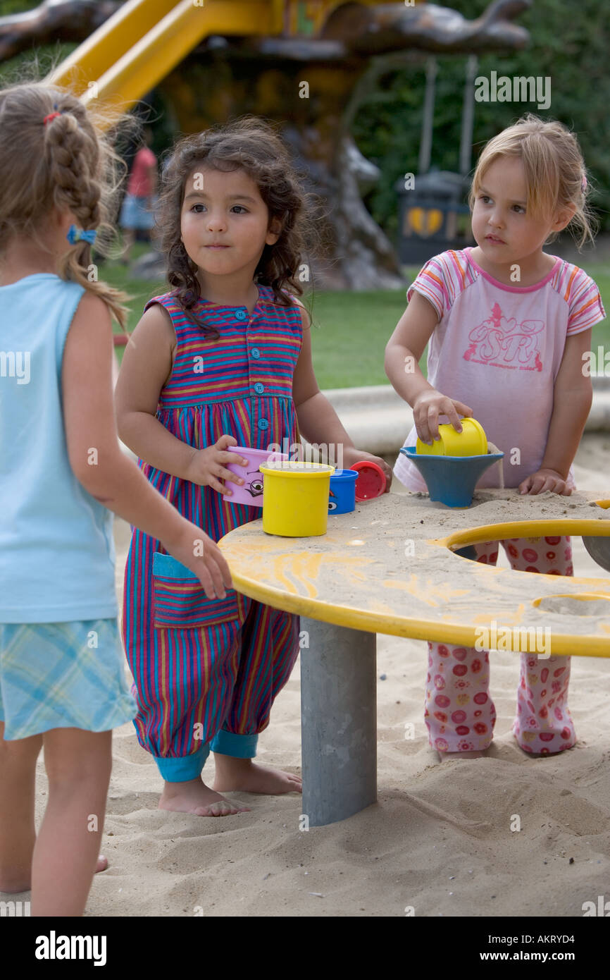 Children playing in sand pit hi-res stock photography and images - Alamy