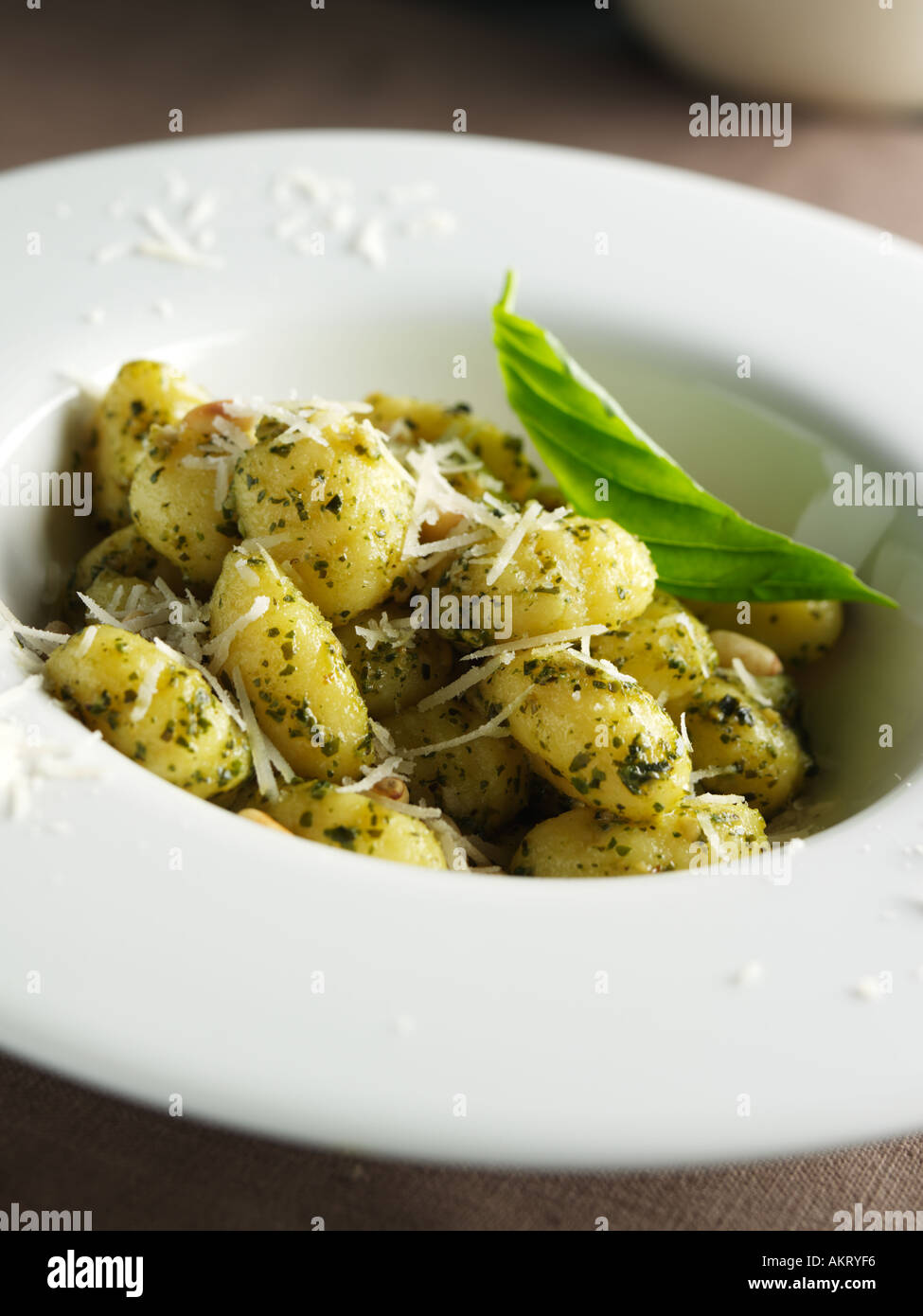 Individual portion gnocchi potato dumplings pesto sauce hi-res stock ...