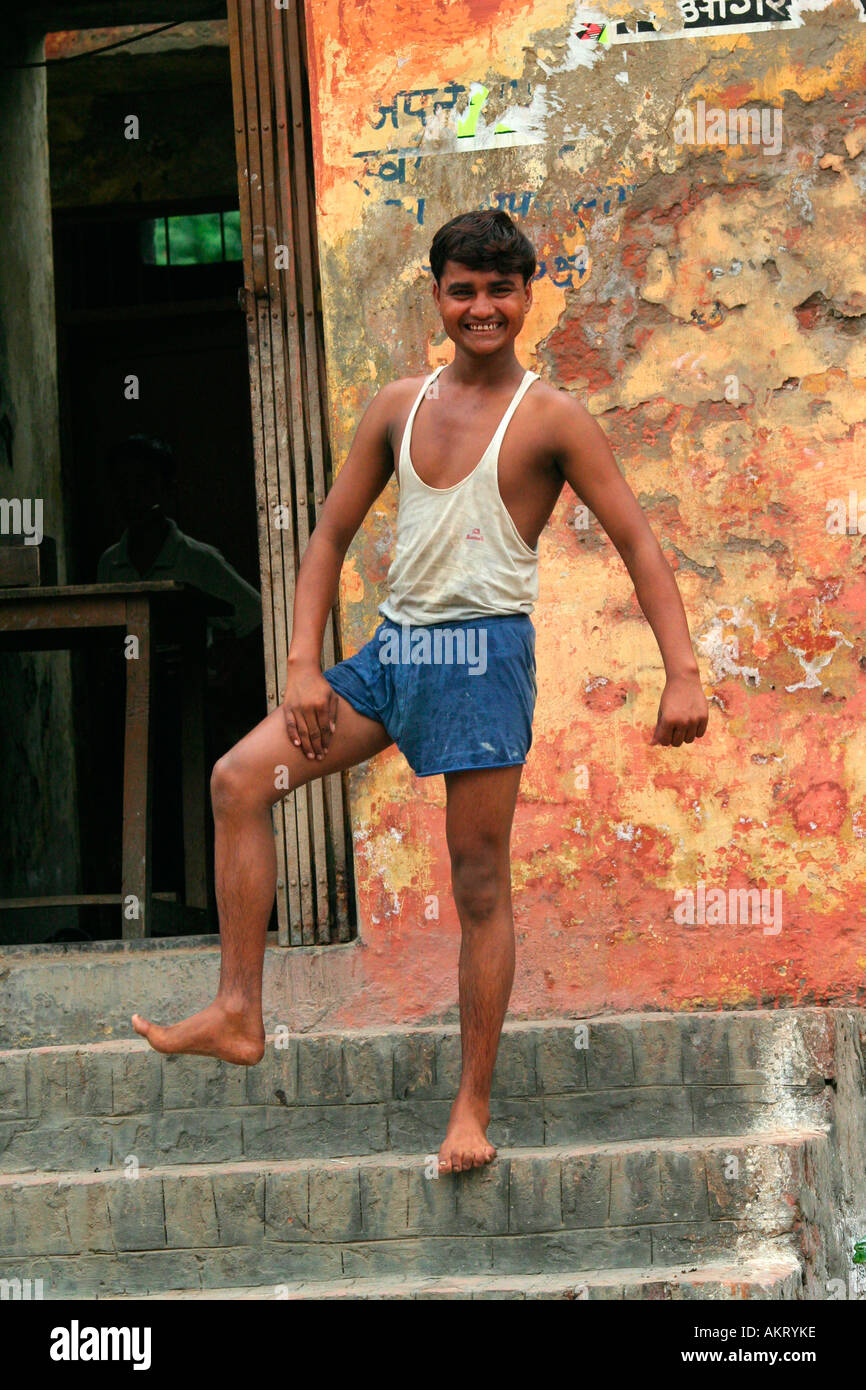 Indian man in shorts standing hi-res stock photography and images - Alamy