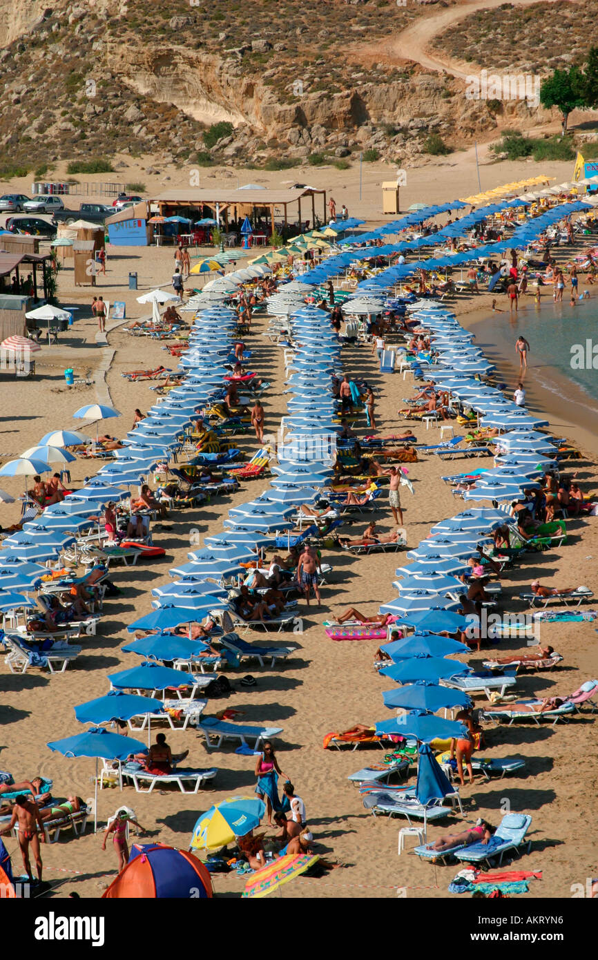 The pattern of the beach umbrella in the golden beach, Haraki, Rhodes ...