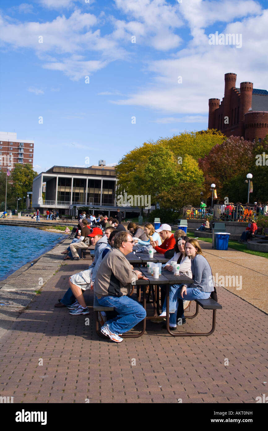 people sitting by Lake Mendota Madison University of Wisconsin Memorial ...
