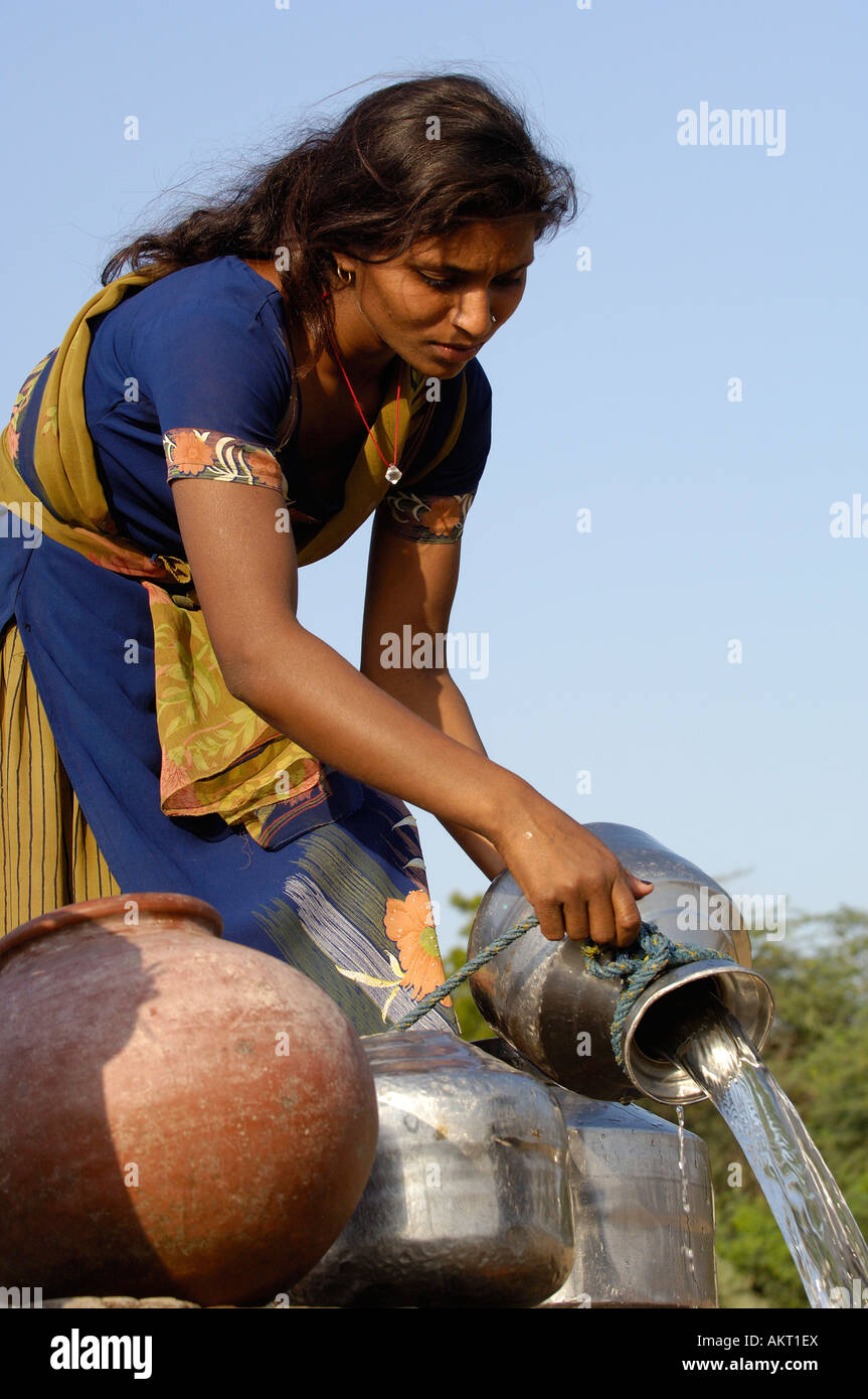 Collecting water from a well hi-res stock photography and images - Alamy