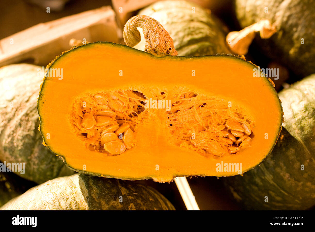 a split pumpkin on display in a venice fruit and vegetable market near ...