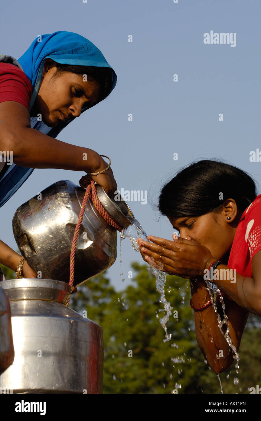Collecting water from a well hi-res stock photography and images - Alamy