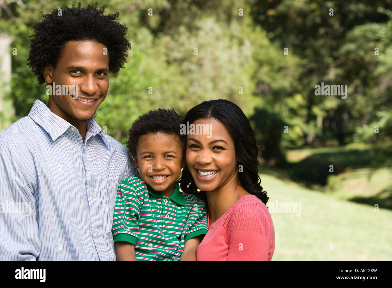 Family portrait of parents and young son smiling Stock Photo - Alamy