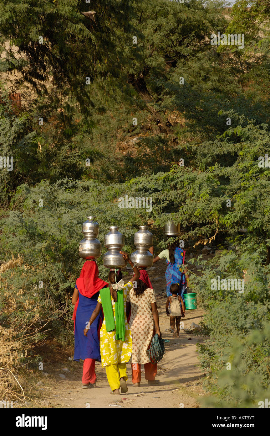 Hindu Woman collecting water from a well in a village near Bharatpur ...