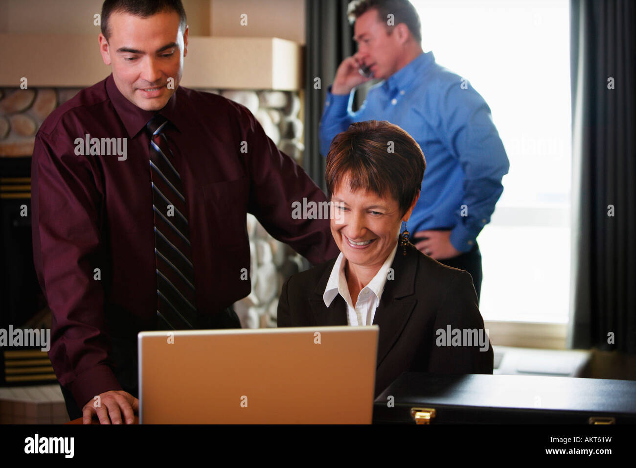 Business people meeting with computer Stock Photo - Alamy