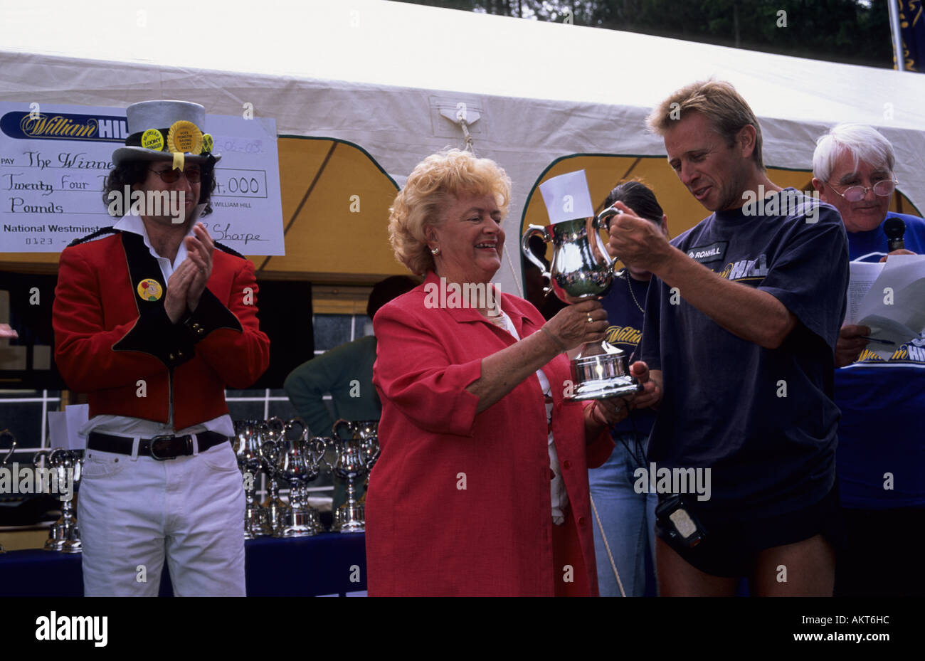 Cynthia Payne presenting prizes to the winning runner at Llanwrytyd ...