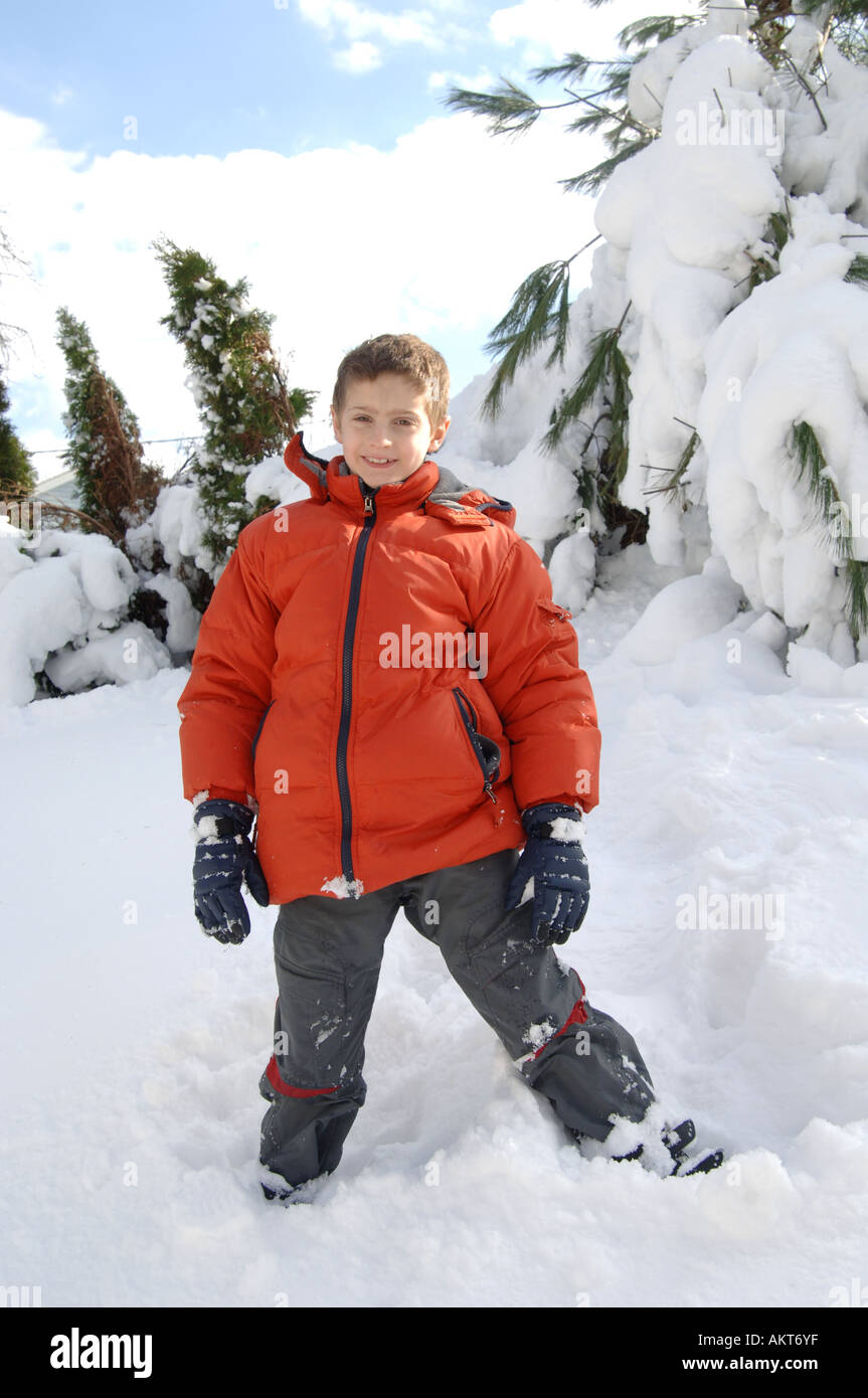 Boy at snow Stock Photo - Alamy