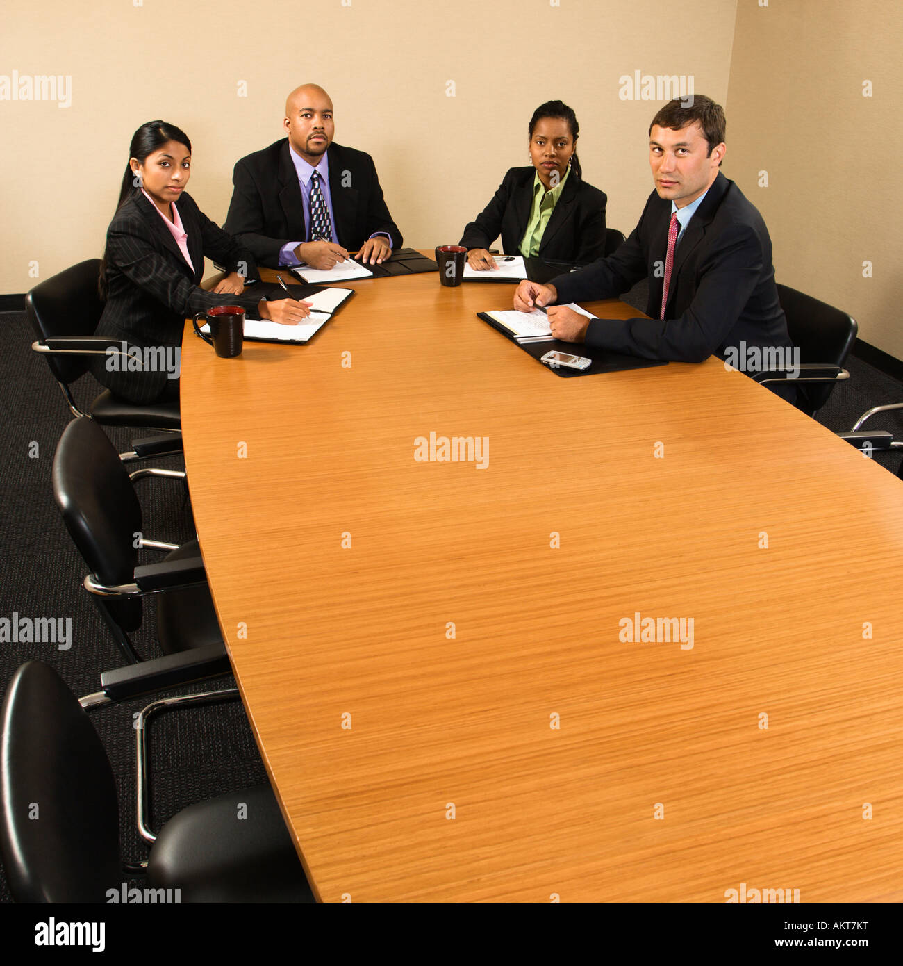 Serious latina woman table hi-res stock photography and images - Alamy