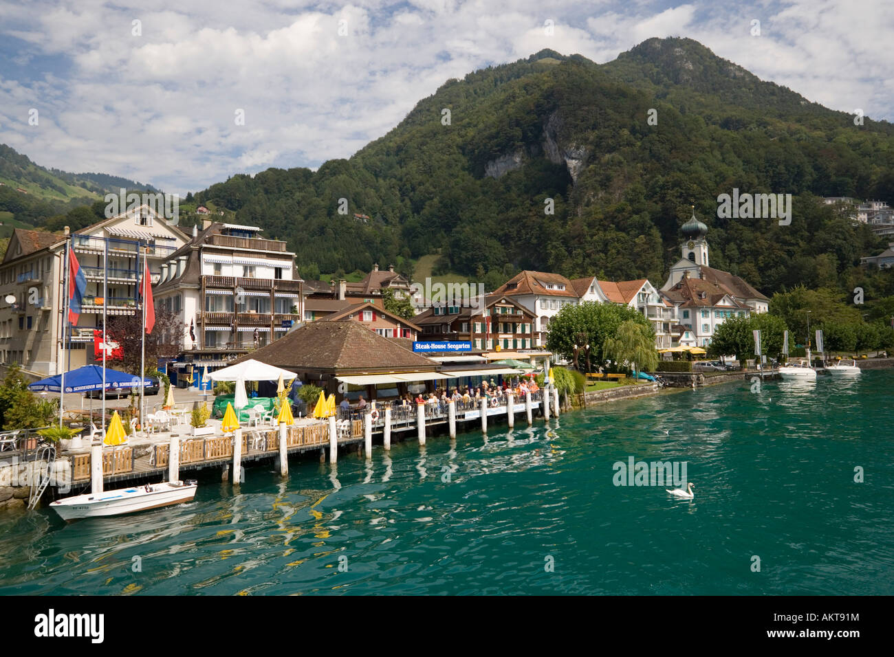 View over Lake Lucerne to Gersau with parish church St Marzellus Gersau ...
