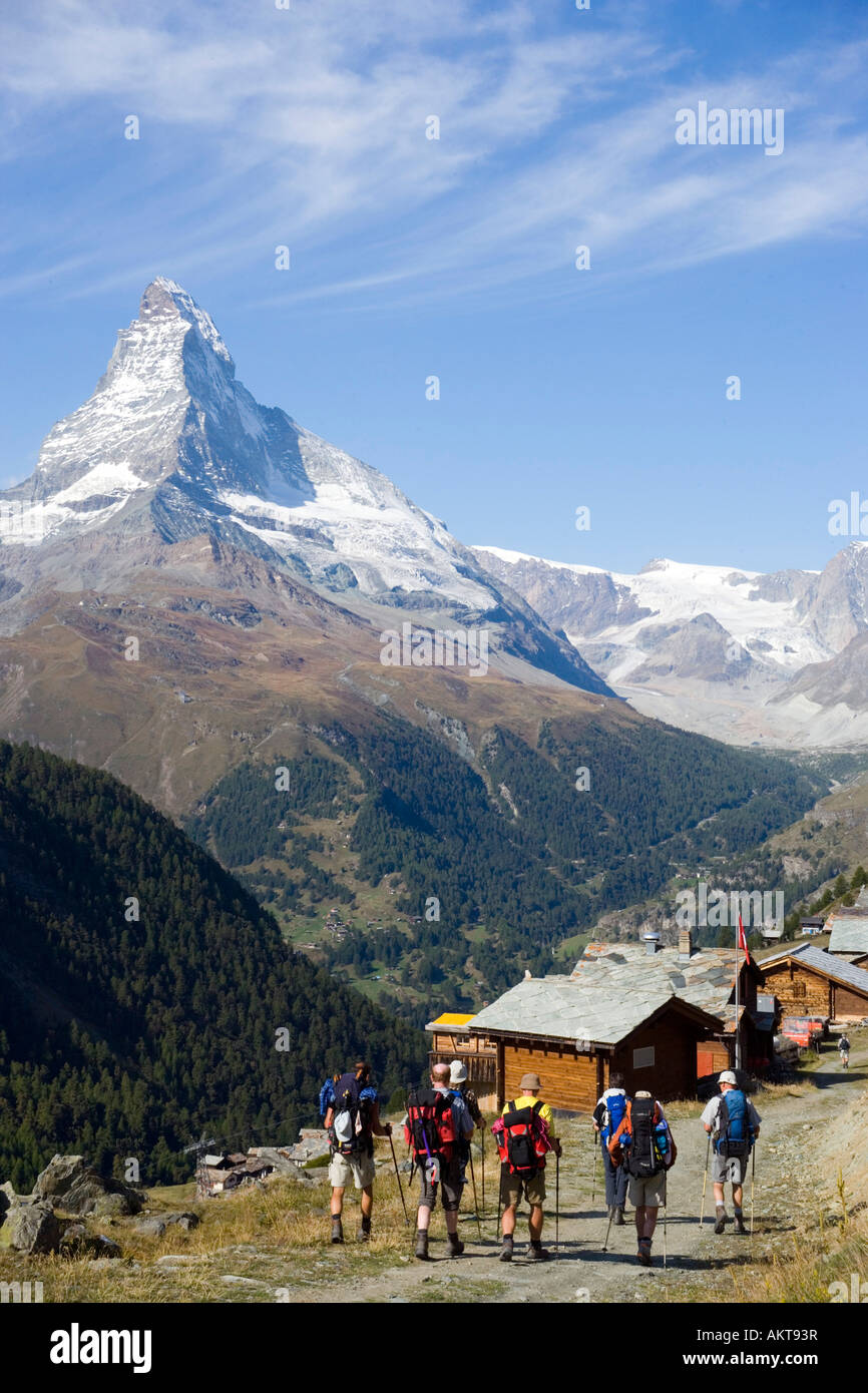 Group of hikers arriving the mountain village Findeln Matterhorn 4478 m ...