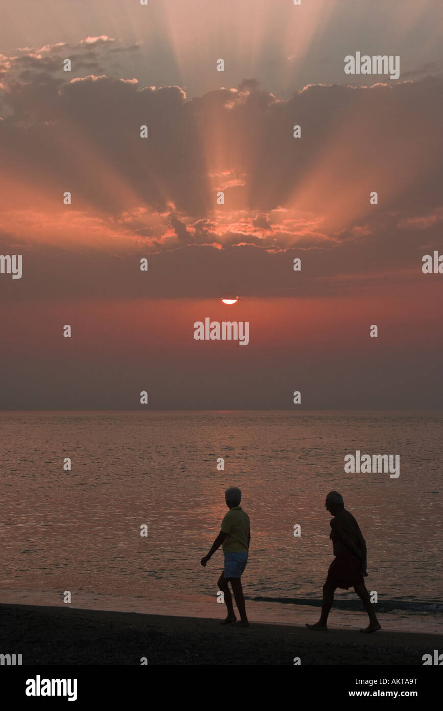 Sun rises in ocean rays hi-res stock photography and images - Alamy