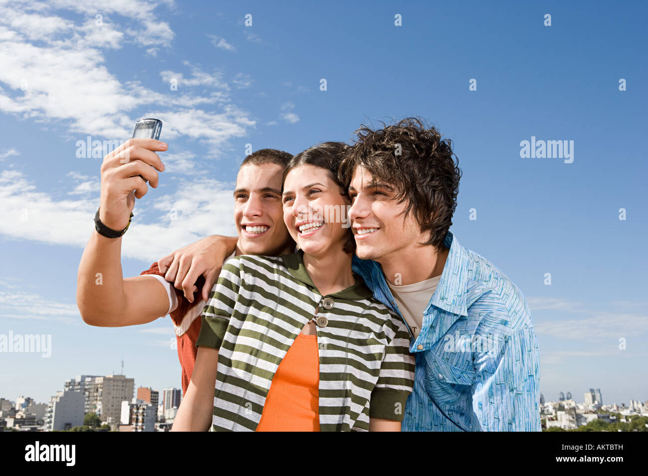 Teenagers posing for camera telephone Stock Photo - Alamy