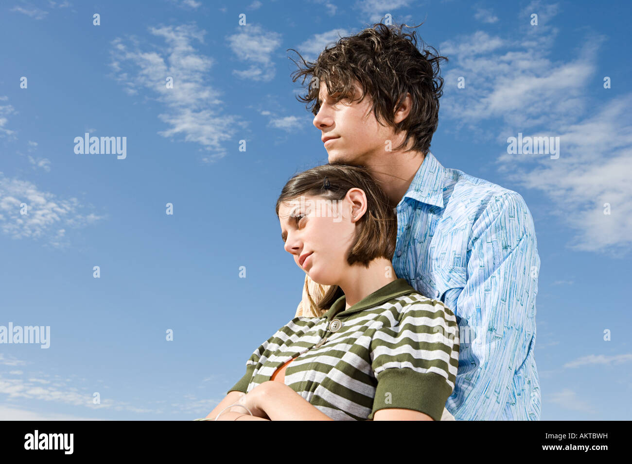 Teen couple hugging Stock Photo - Alamy