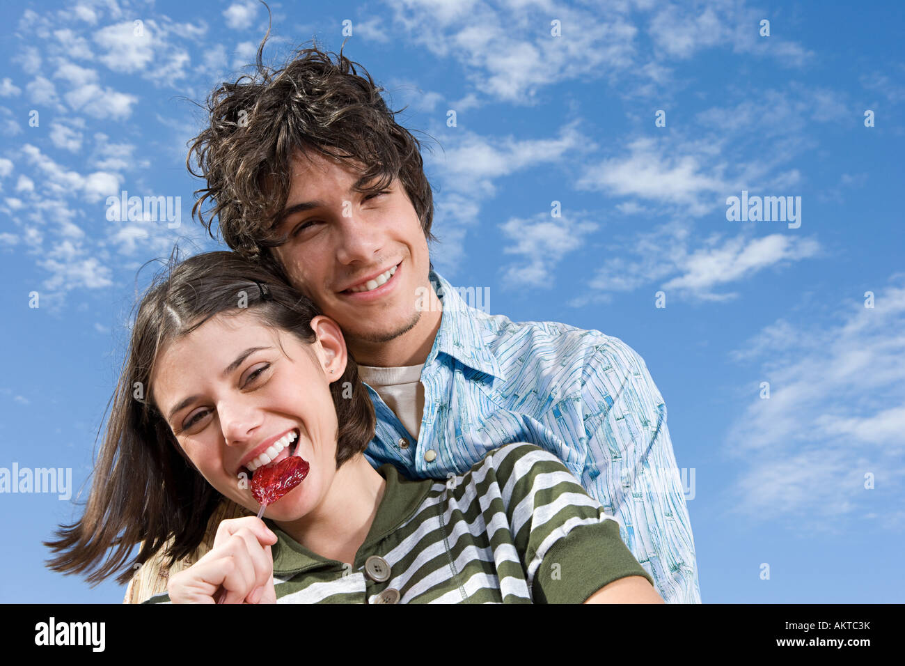 Teen couple hugging Stock Photo - Alamy