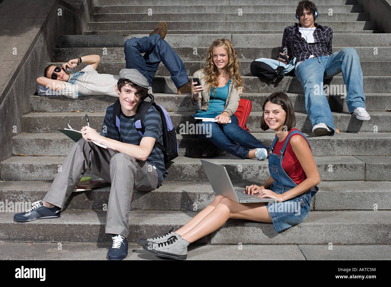 High school students sitting on steps Stock Photo - Alamy