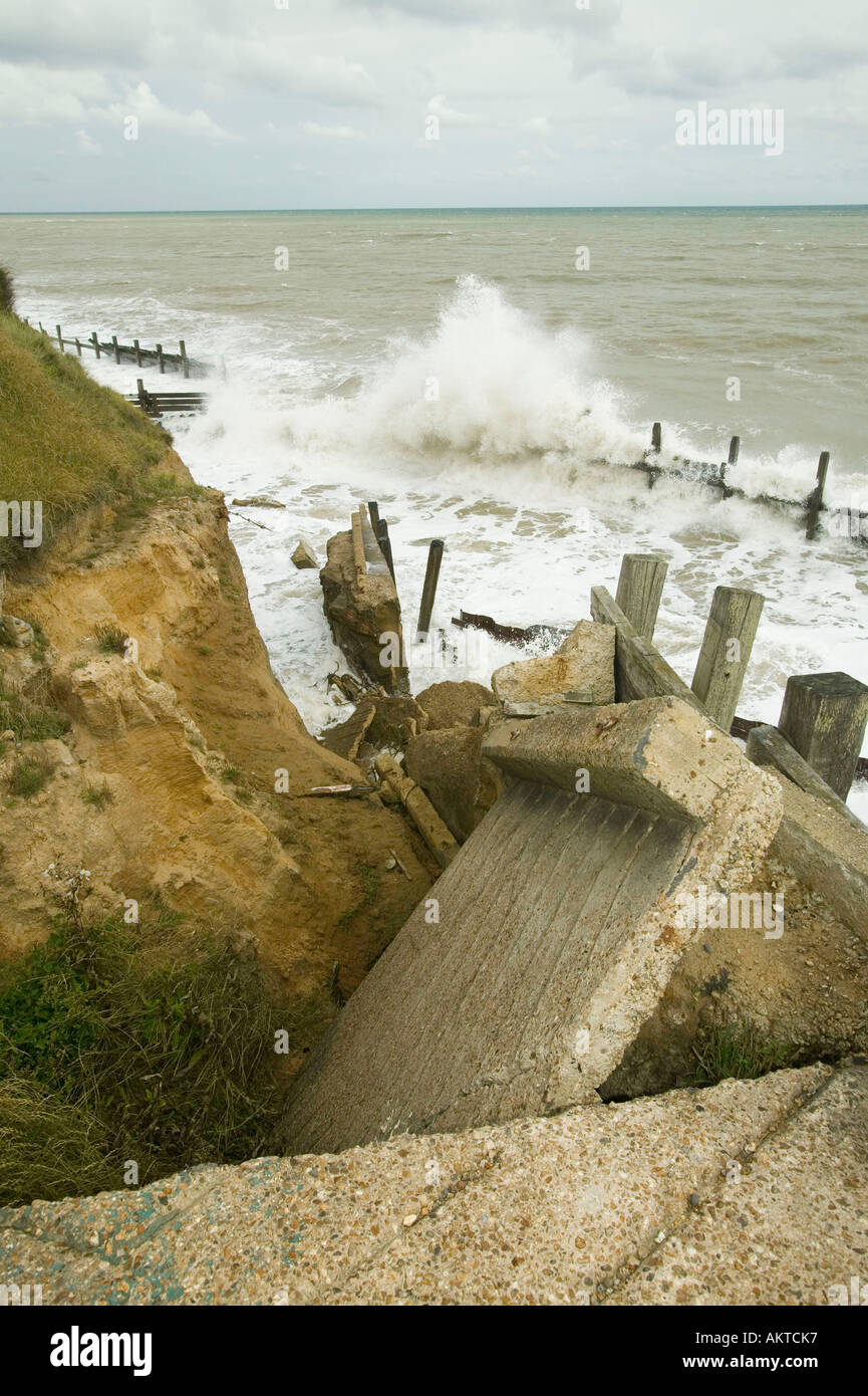 Storm waves eroding the cliffs at Happisburgh, Norfolk, UK, with the ...