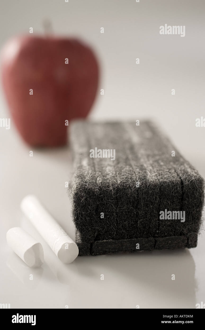 Apple board rubber and chalk Stock Photo - Alamy