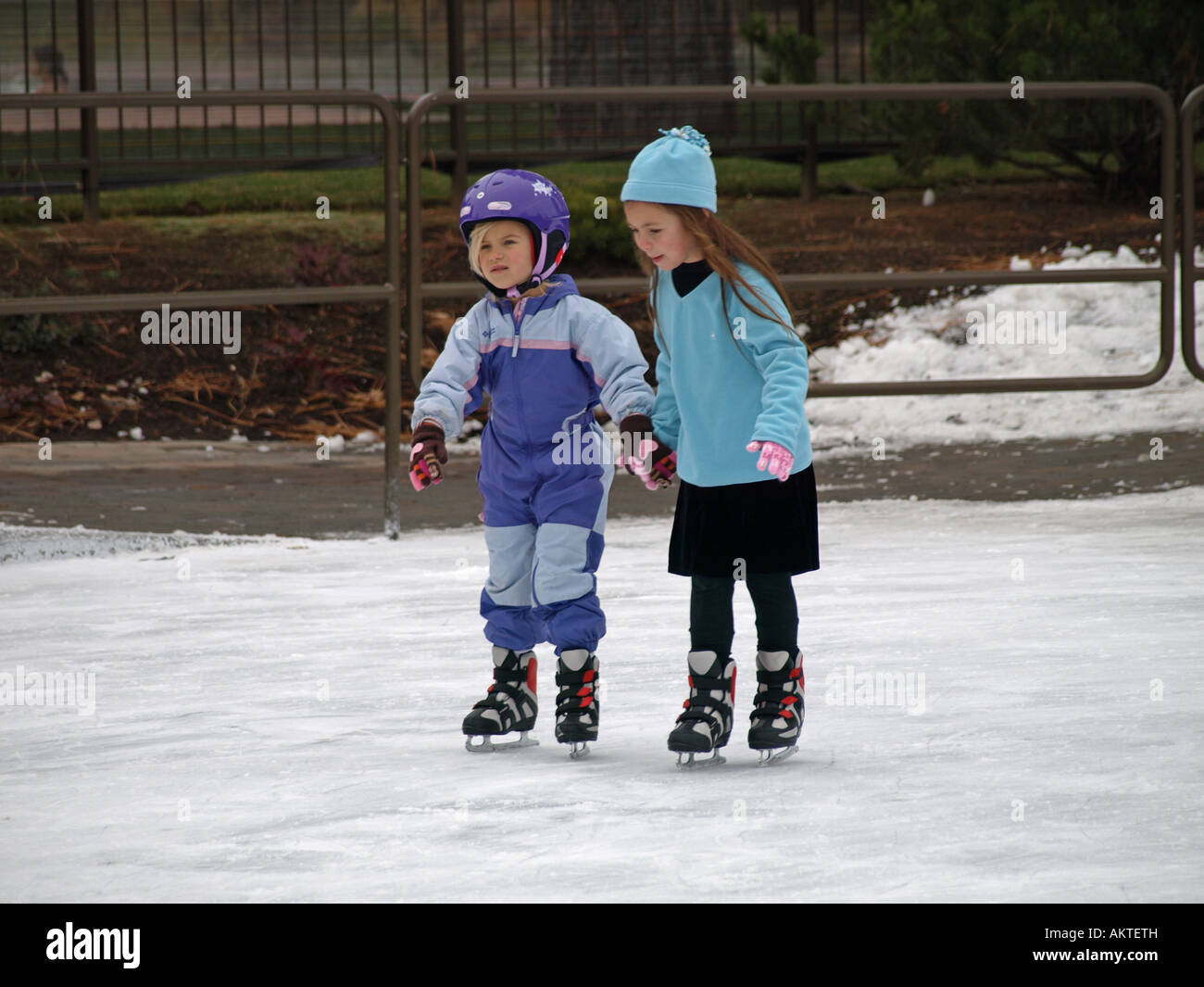 Ice skaters enjoy a fun day on the ice rink at the Inn Of The Seventh ...
