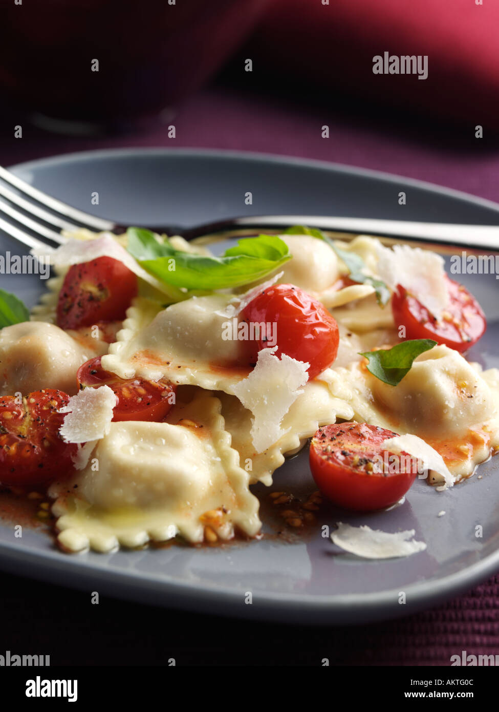 Ravioli filled pasta char grilled tomatoes hi-res stock photography and ...