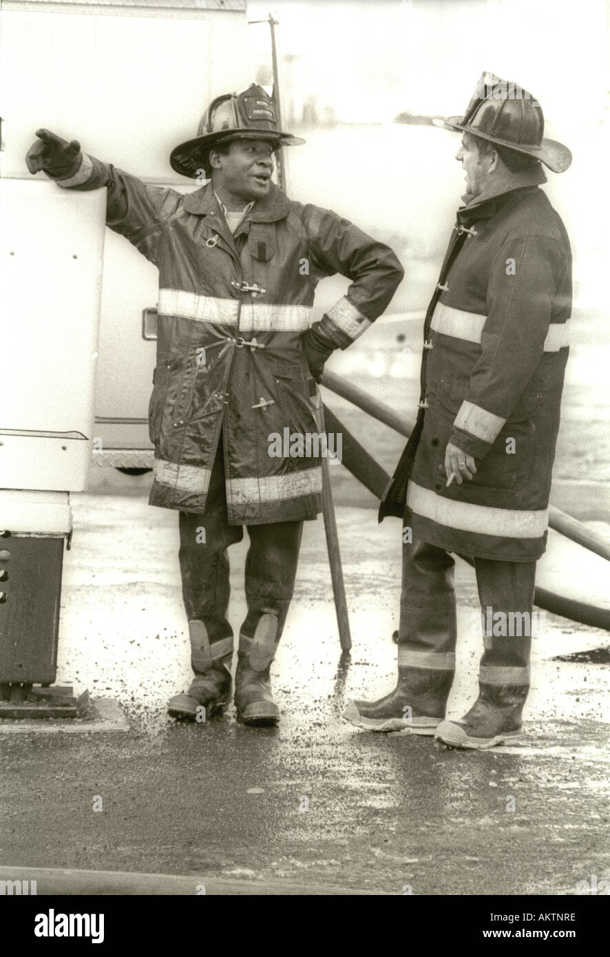 Fire fighter talking hi-res stock photography and images - Alamy