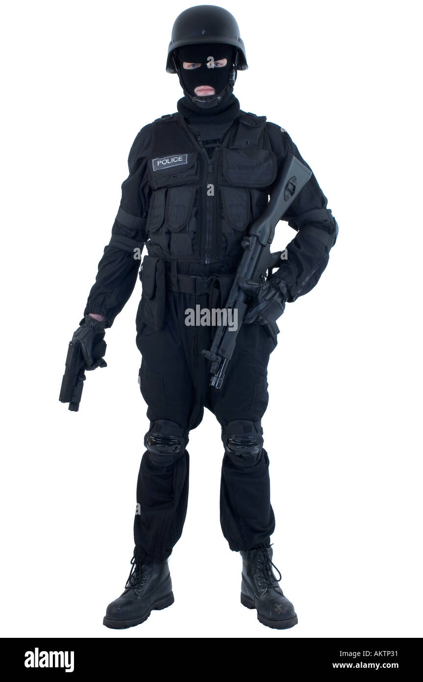 a swat police officer in full uniform with helmet and mp5 machine gun ...