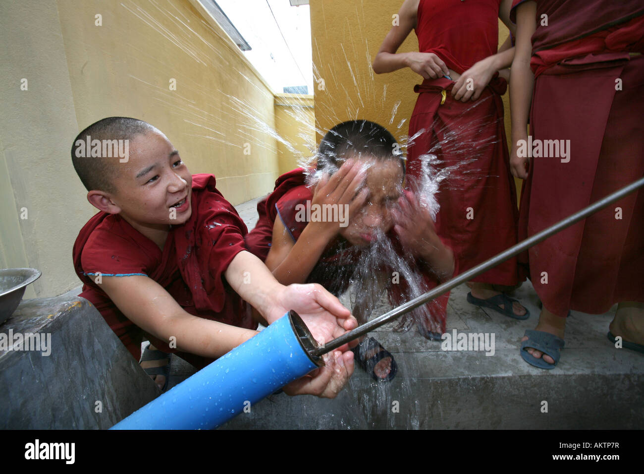 Monk washing clothes hi-res stock photography and images - Alamy