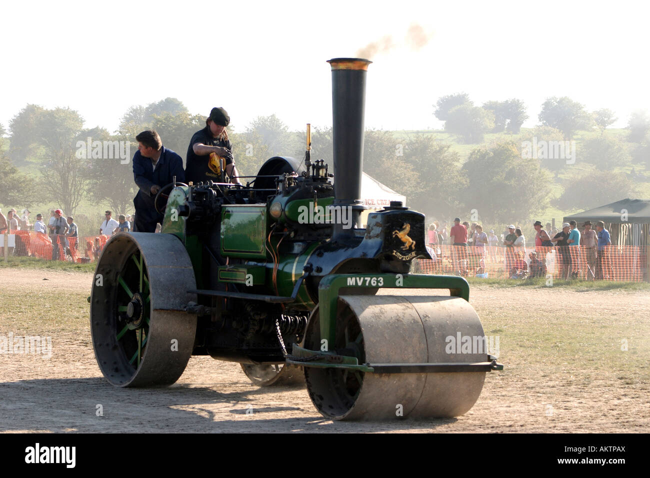 Vintage steam roller driven by two men at Great Dorset Steam Rally 2005 ...