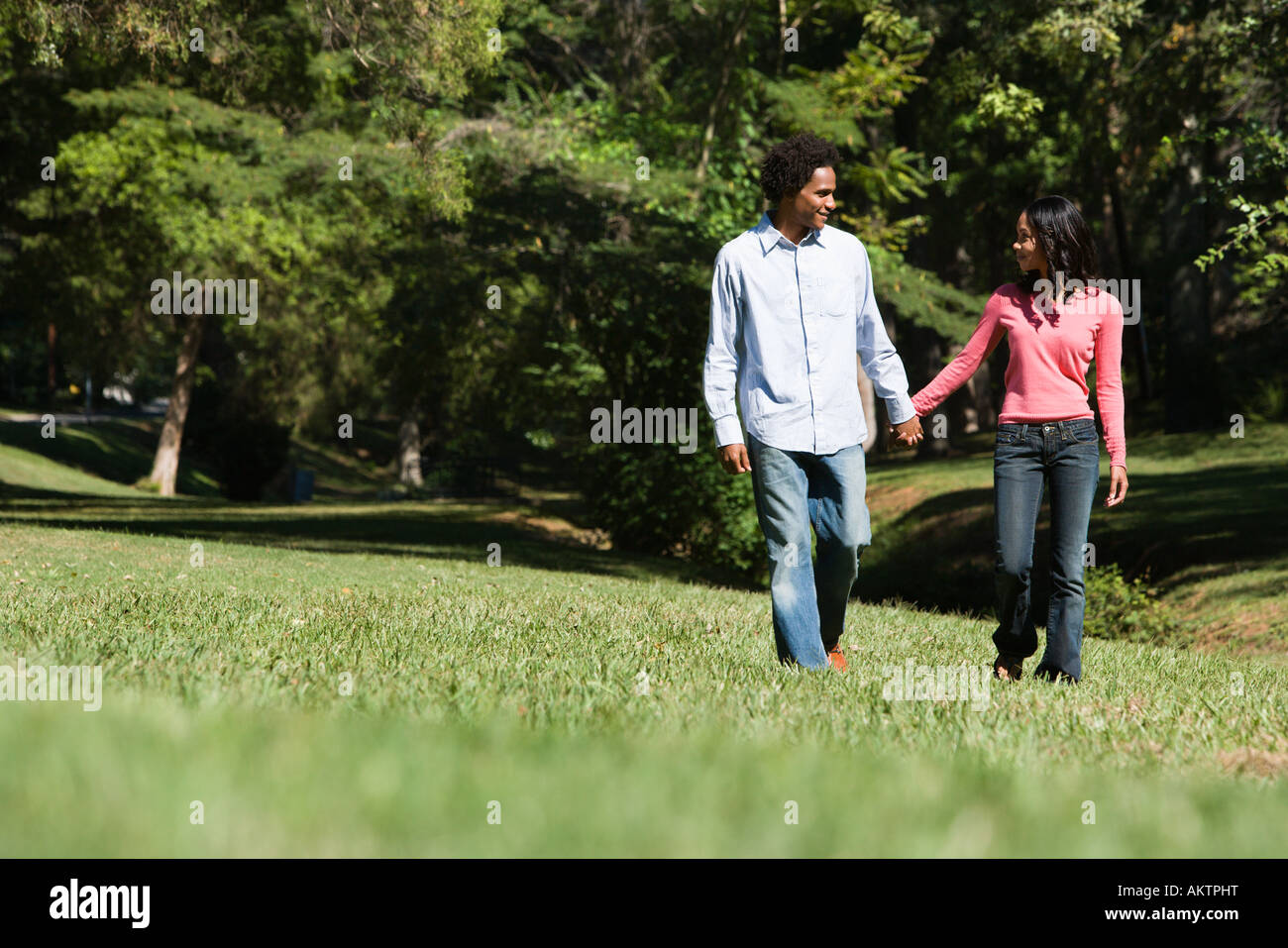 Smiling woman talking walking hi-res stock photography and images - Alamy